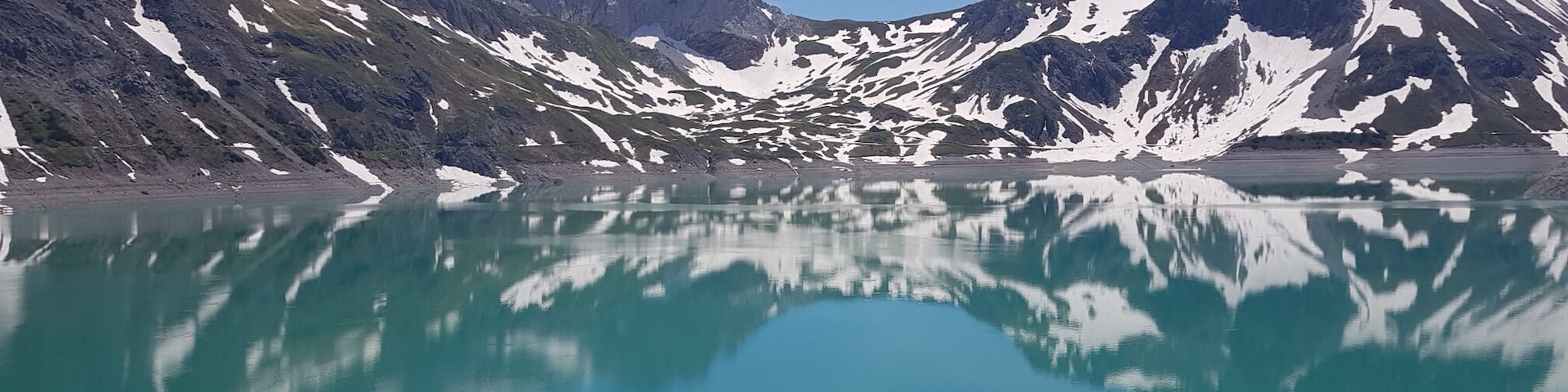 Beautiful reflection of the mountains in the Lünersee at 1973 meters high!