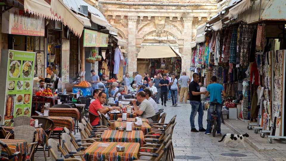 Mahane Yehuda Market which includes markets, outdoor eating and street scenes