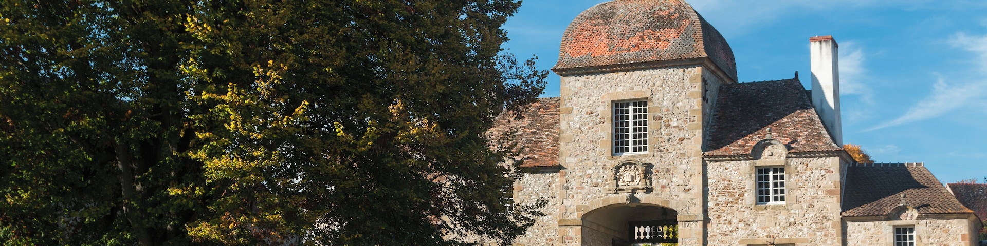 The “Porterie”, gatehouse views from the gardens. The building now houses artist workshops.