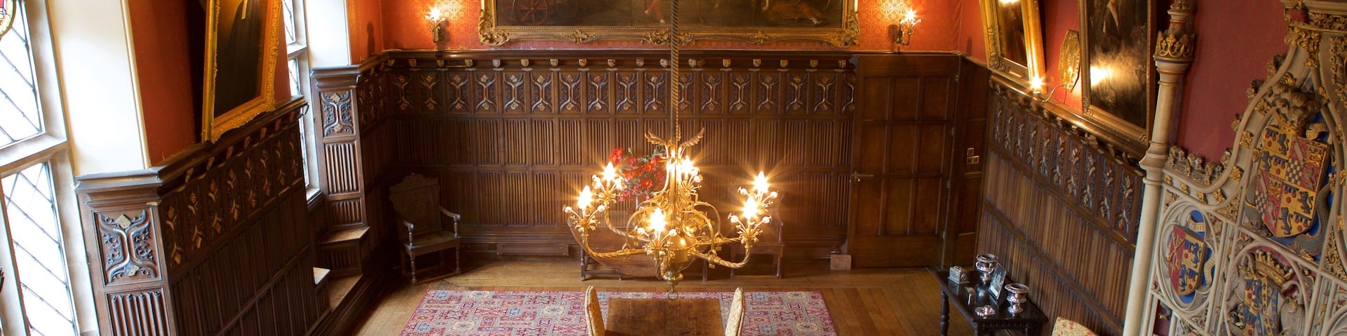 Powderham Castle which includes interior views, a castle and art