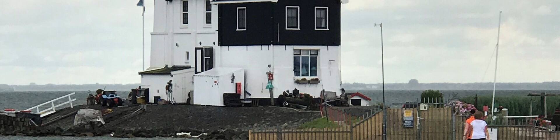 Take a walk from the harbor to this lighthouse to enjoy the countryside far from tourists.