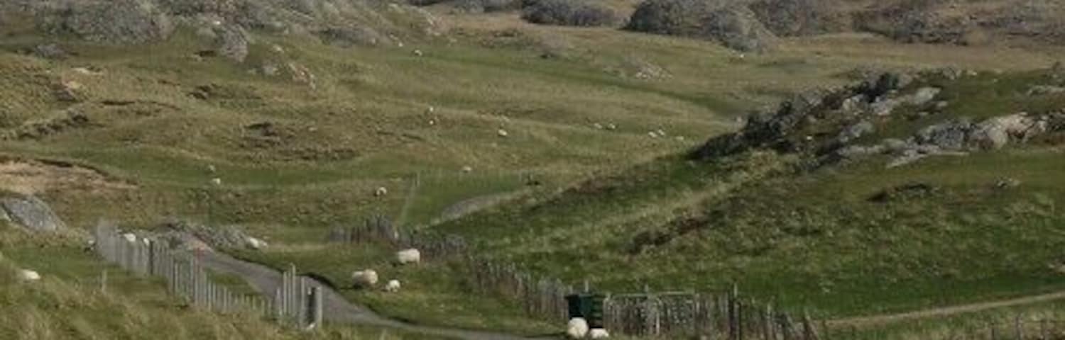Road with a view. View to the mountains of Rum from a high point on Coll's north road.