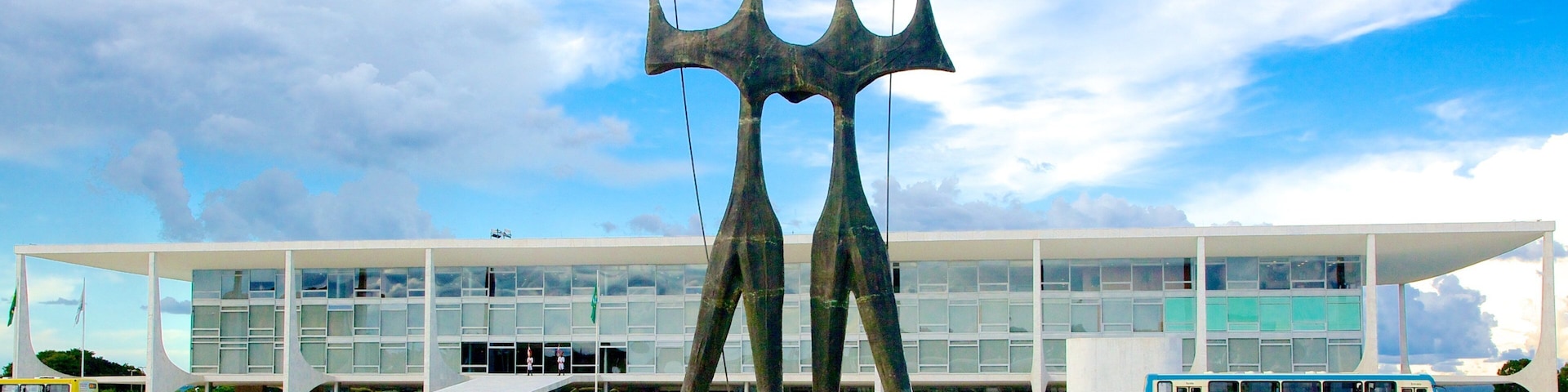 Square of the Three Powers showing a city, a square or plaza and a statue or sculpture