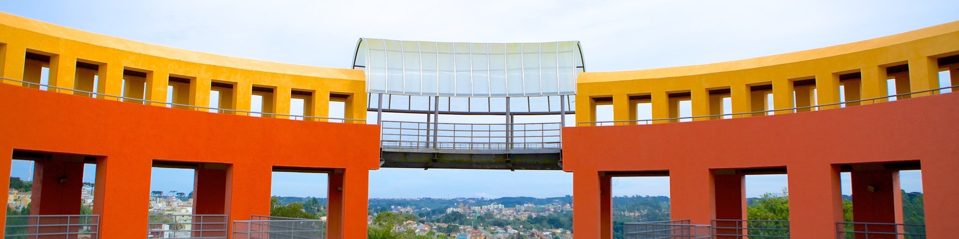 Tangua Park featuring modern architecture and a pond