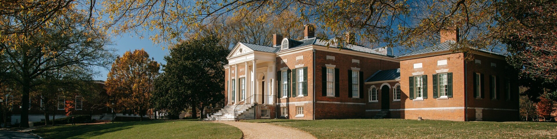 Homewood Museum which includes a park, autumn leaves and heritage architecture