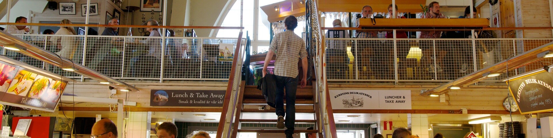 Fish Market showing interior views and markets as well as a large group of people