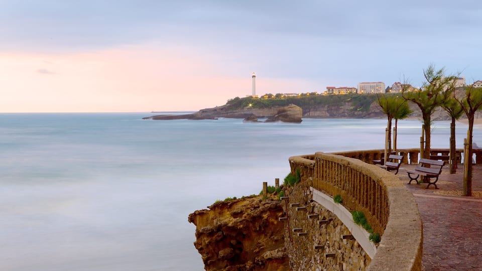 Old Harbor featuring general coastal views and a sunset