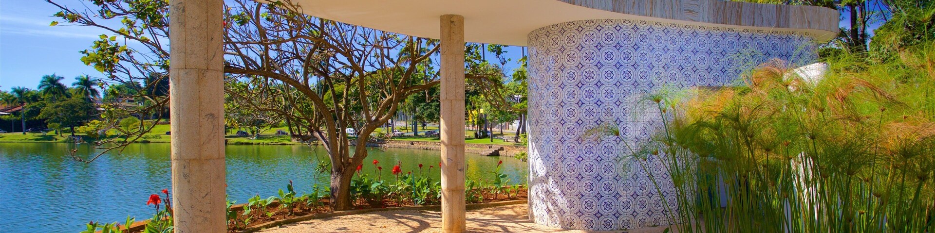 Casa do Baile featuring flowers, a lake or waterhole and a garden