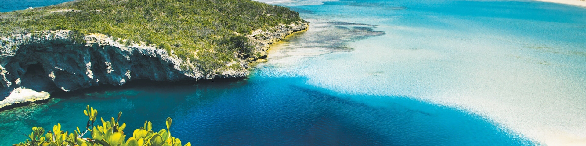 Dean\'s Blue Hole showing rugged coastline, general coastal views and tropical scenes