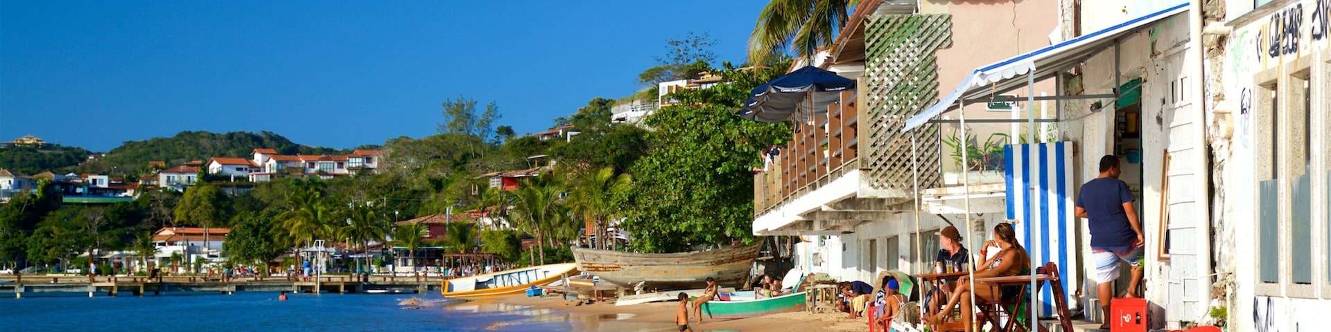 Canto Beach which includes general coastal views, a coastal town and a sandy beach