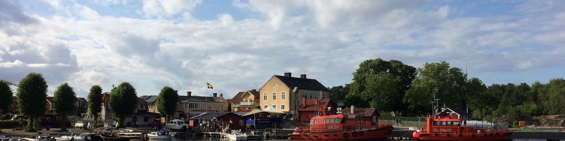 Last stop before open Baltic Sea. Quaint sailing village and forest isle. Go during the week on the ferry from Stockholm, walk to Trouvill beach, then take last ferry back.