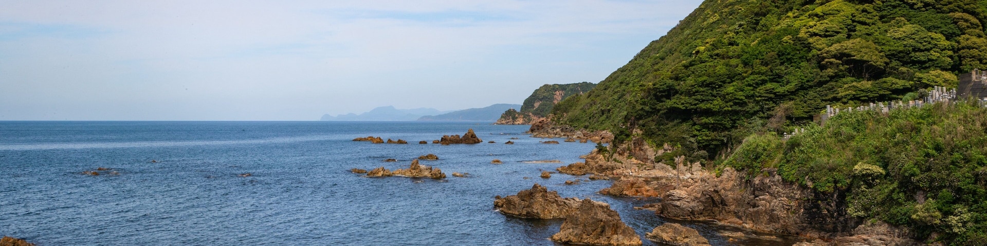 Kinosaki Marine World featuring rocky coastline and general coastal views