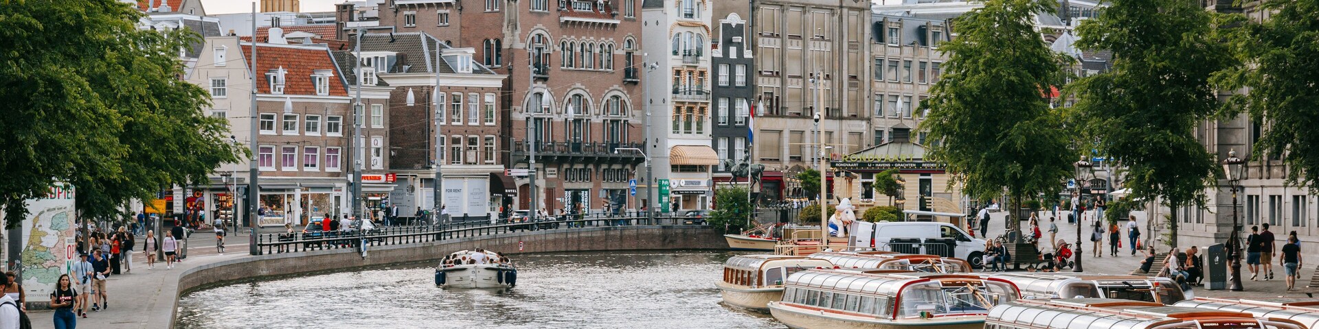 Old Town Amsterdam showing boating, a river or creek and a city