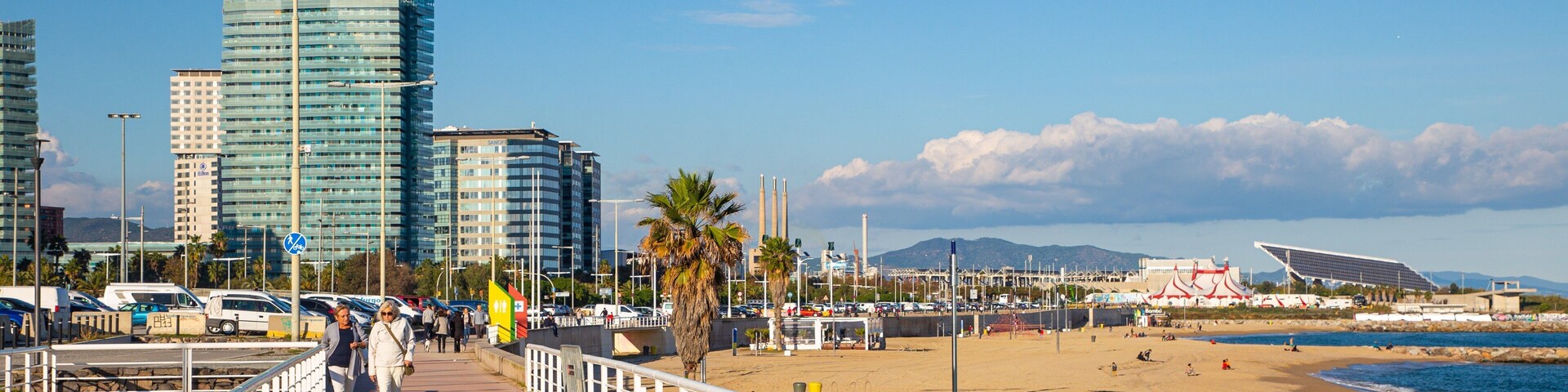 Mar Bella Beach showing a coastal town and a beach