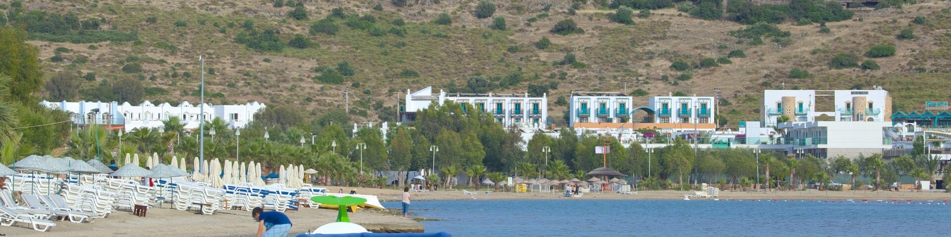 Bardakci Beach featuring a beach and a coastal town