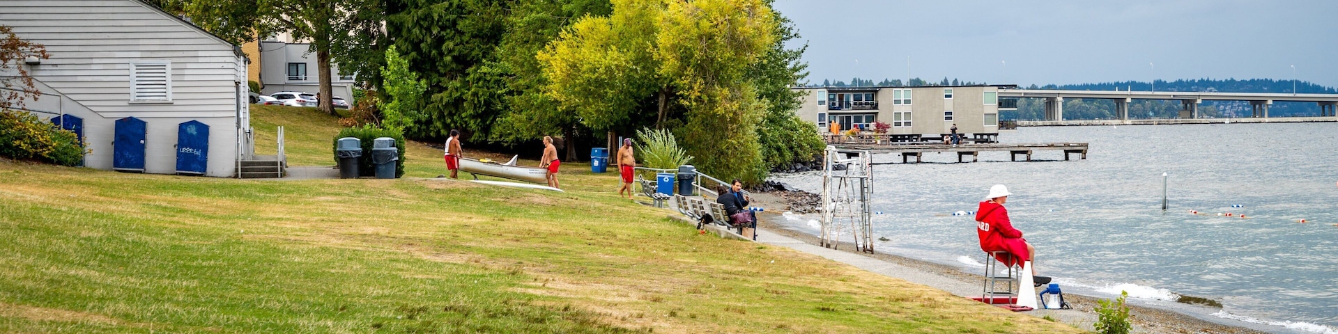 Madison Park Beach which includes a garden and a lake or waterhole