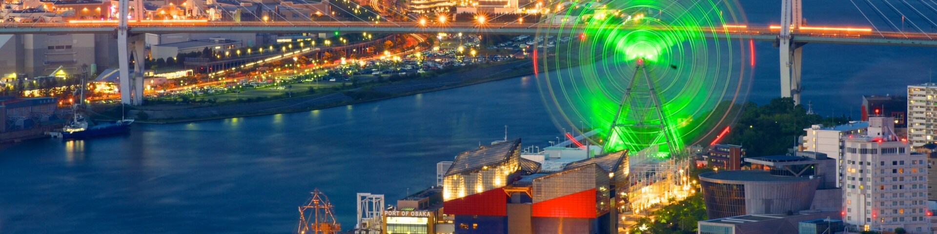 Osaka Prefectural Government Sakishima Building showing a river or creek, night scenes and a city