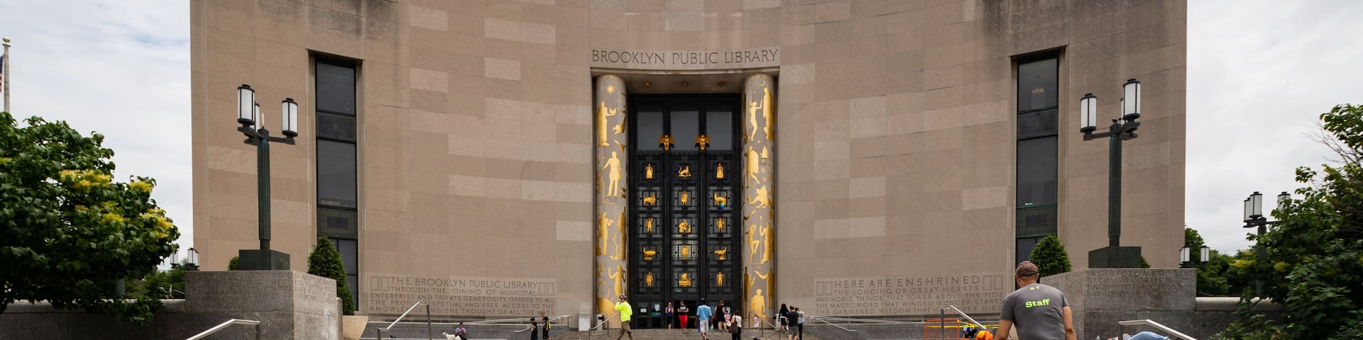 Brooklyn Public Library featuring street scenes, signage and an administrative buidling