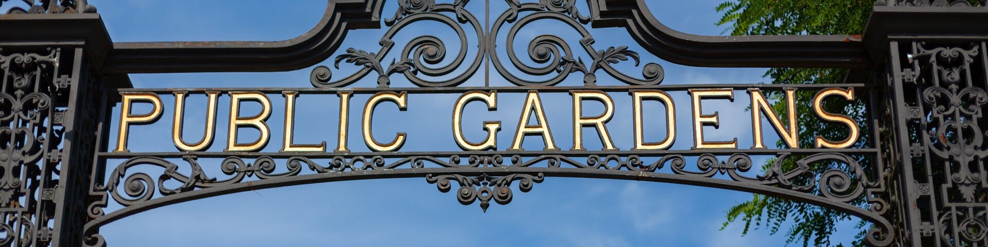 Halifax Public Gardens featuring heritage elements and signage