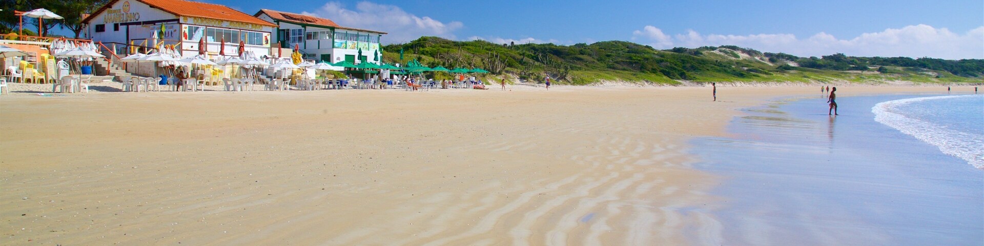 Conchas Beach featuring a sandy beach, general coastal views and a coastal town