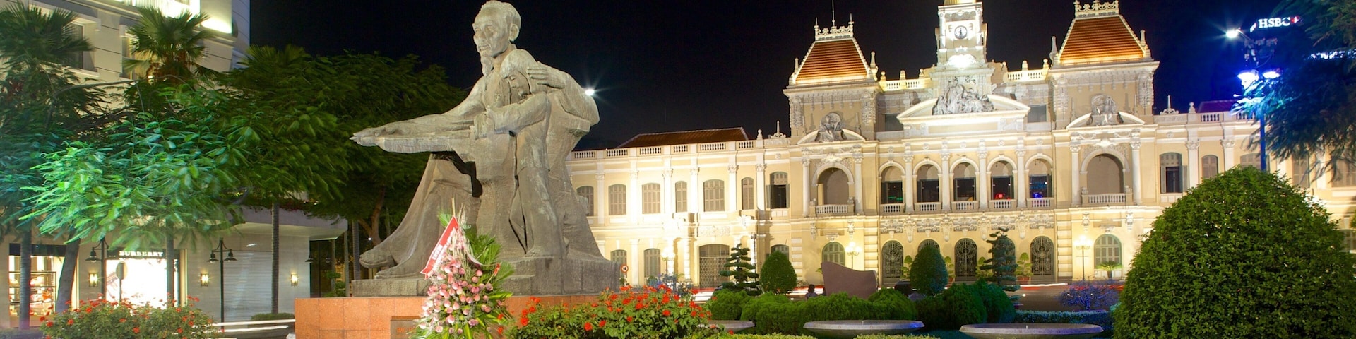 Dong Khoi Street which includes a square or plaza, a statue or sculpture and night scenes