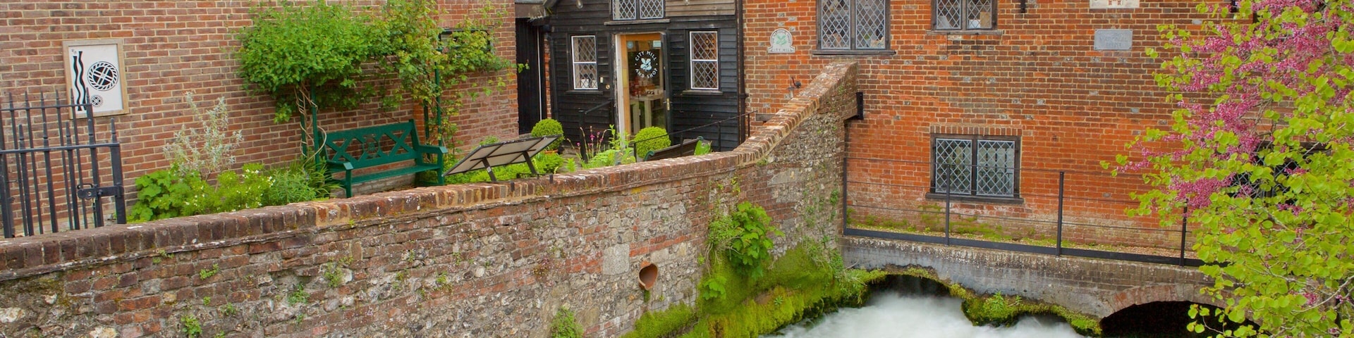 Winchester City Mill featuring a river or creek and heritage architecture