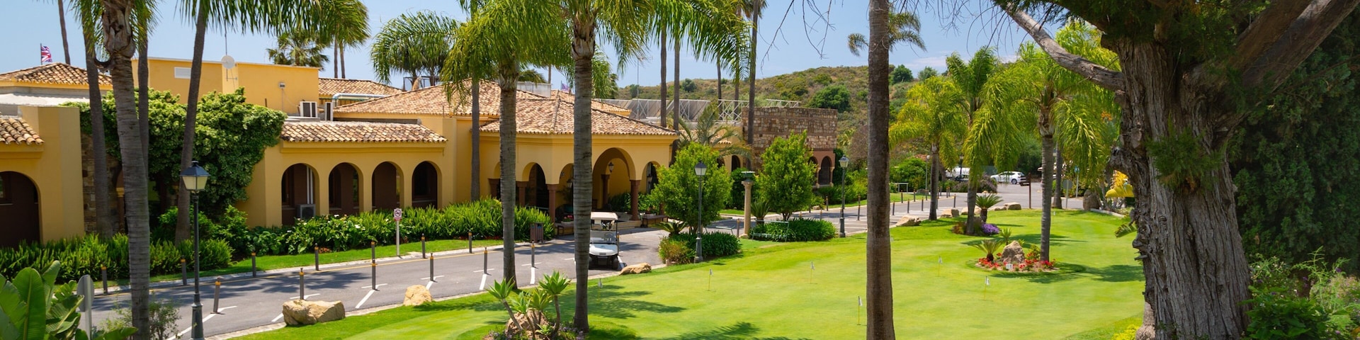 Marbella Golf and Country Club showing a house and a park