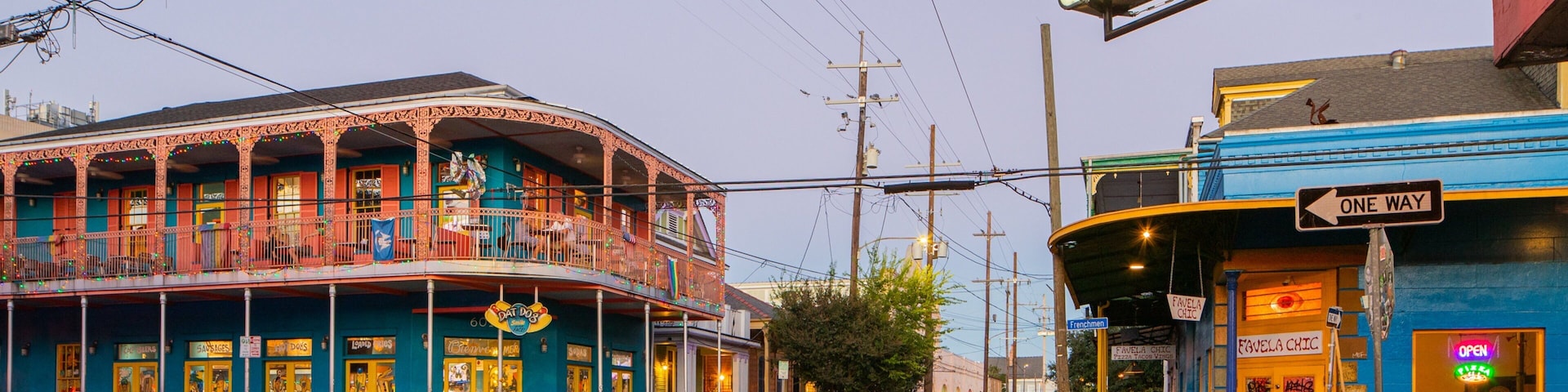 Frenchmen Street featuring street scenes, a small town or village and signage