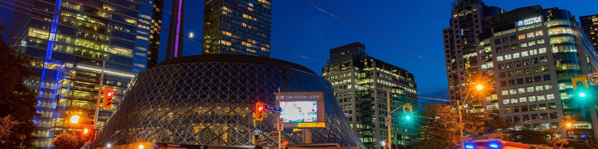 Toronto Entertainment District showing night scenes and a city