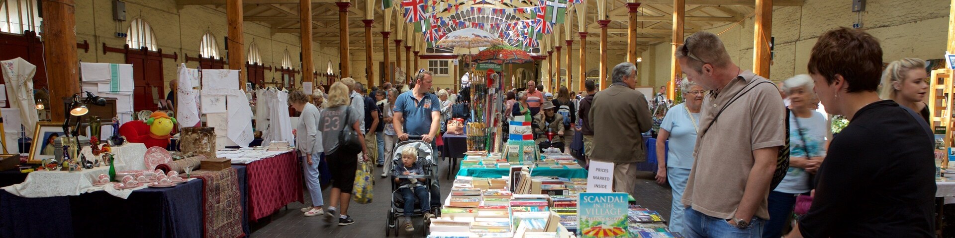 Pannier Market which includes markets and interior views as well as a large group of people