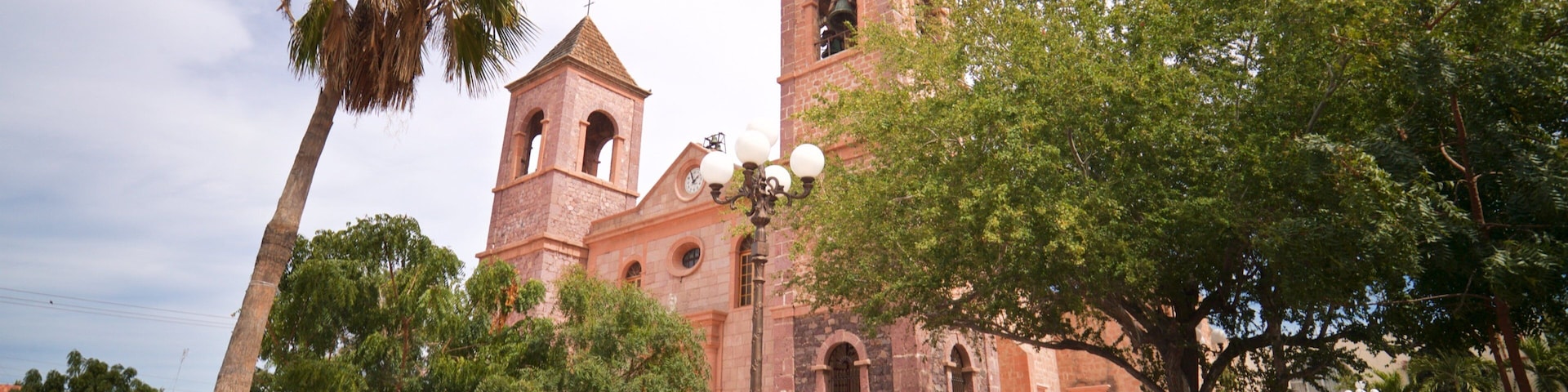 Nuestra Senora del Pilar Cathedral which includes a park and a church or cathedral