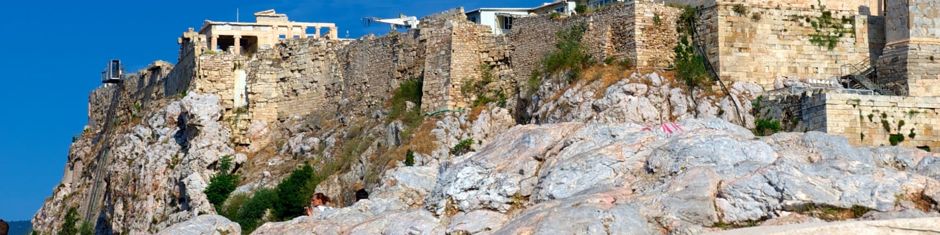 Atenas que inclui uma ruína e elementos de patrimônio