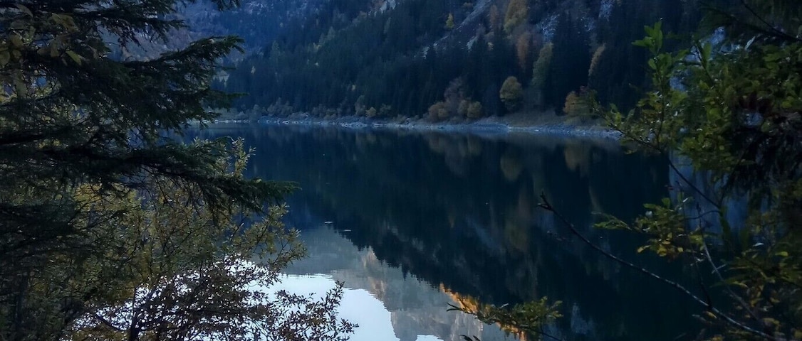 A challenging hike up is rewarded by the stunning Swiss scenery at arrival at Lac de Taney #lifeatexpedia #autumnmagic