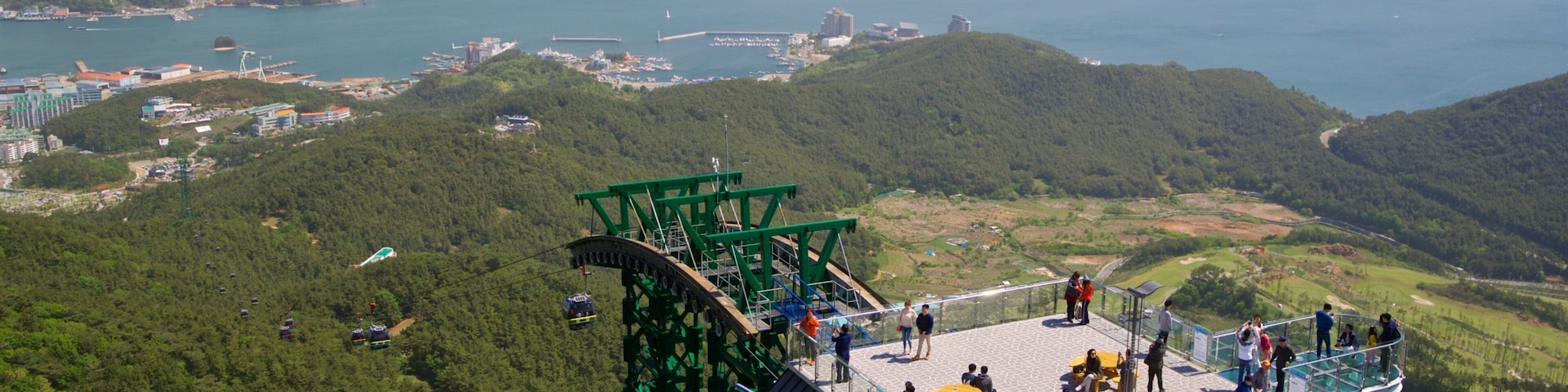 Hallyeo Waterway Observation Cable Car featuring tranquil scenes, a gondola and landscape views