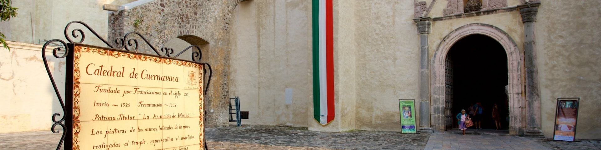 Cuernavaca Cathedral featuring heritage elements and signage