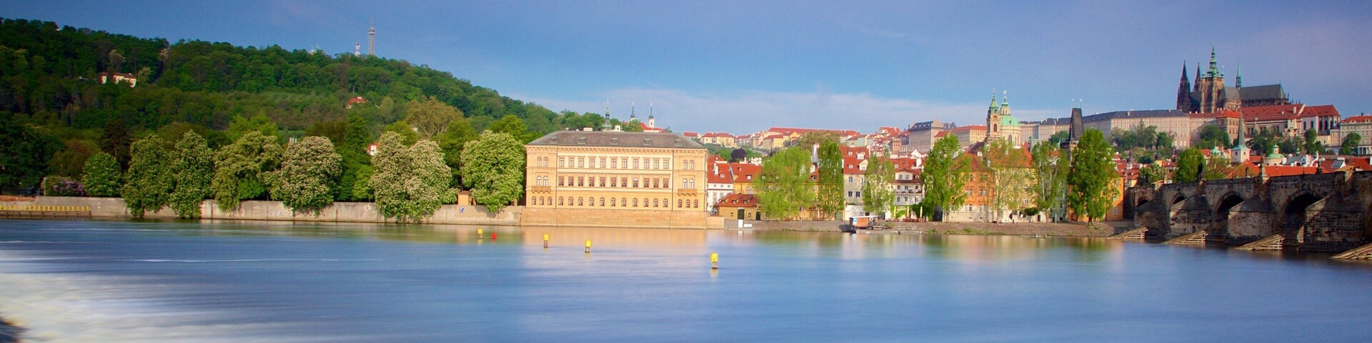 Hradcany Castle District featuring a coastal town and general coastal views