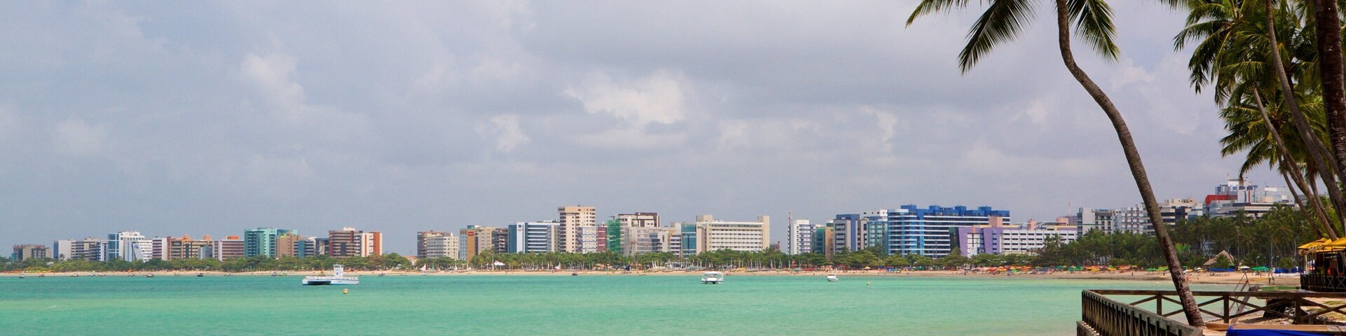 Ponta Verde Beach featuring a beach, a coastal town and general coastal views