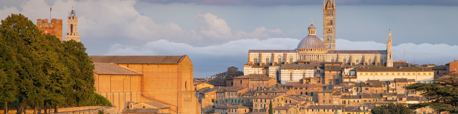 Fortezza Medicea featuring a sunset, a city and landscape views