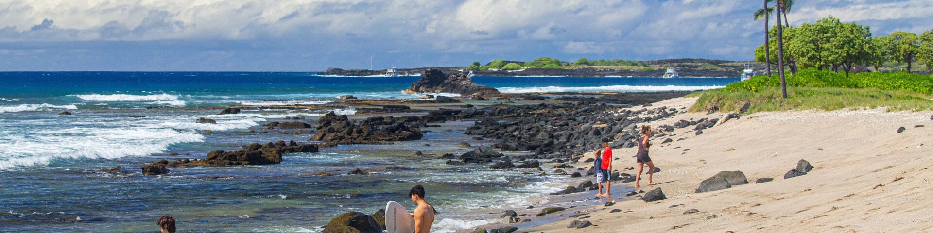 Old Kona Airport State Recreation Area which includes a sandy beach and general coastal views