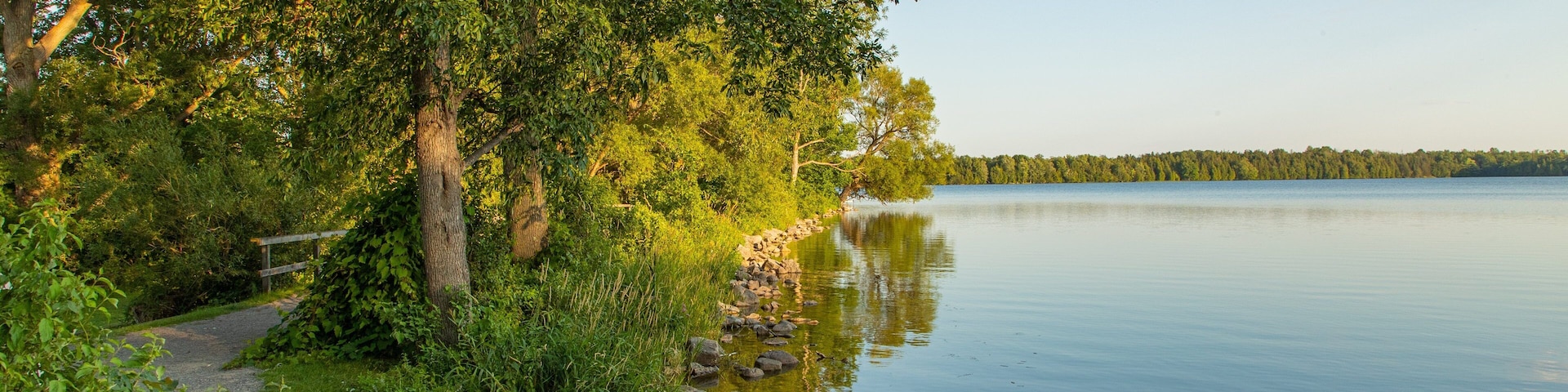 Lake on the Mountain Provincial Park which includes a lake or waterhole and a sunset