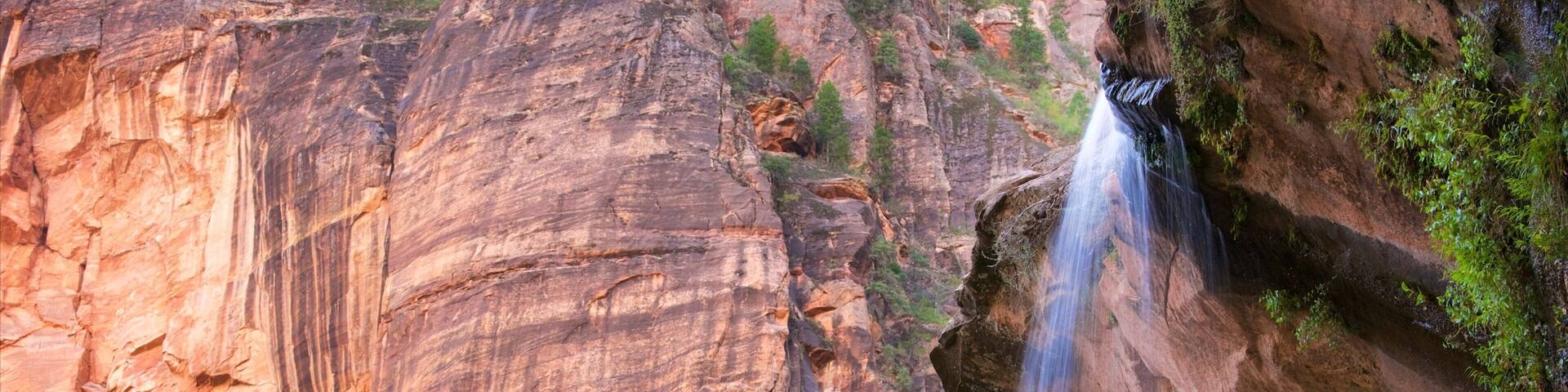 Emerald Pools which includes tranquil scenes and a waterfall