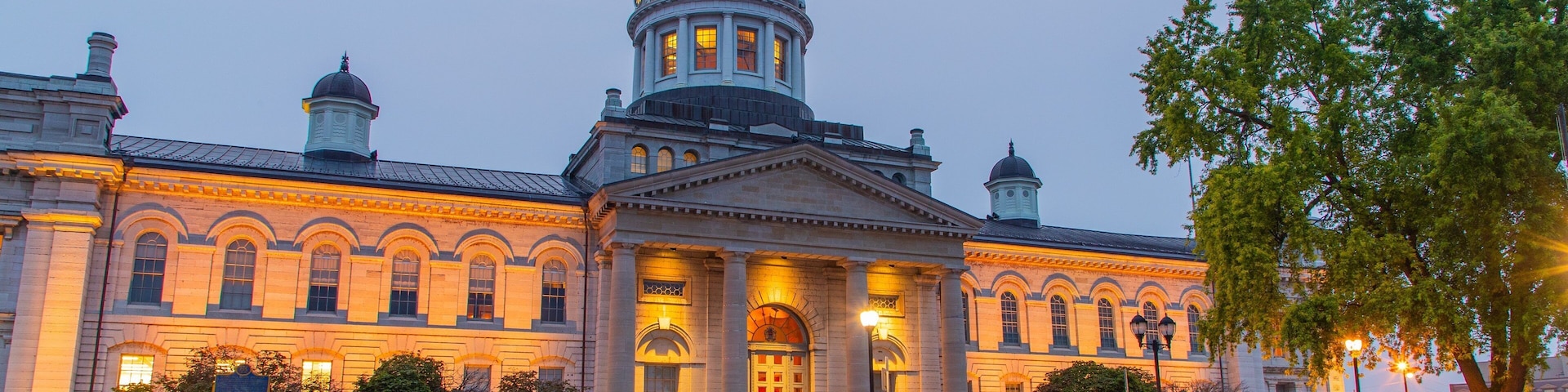 Kingston City Hall featuring night scenes, an administrative buidling and heritage architecture