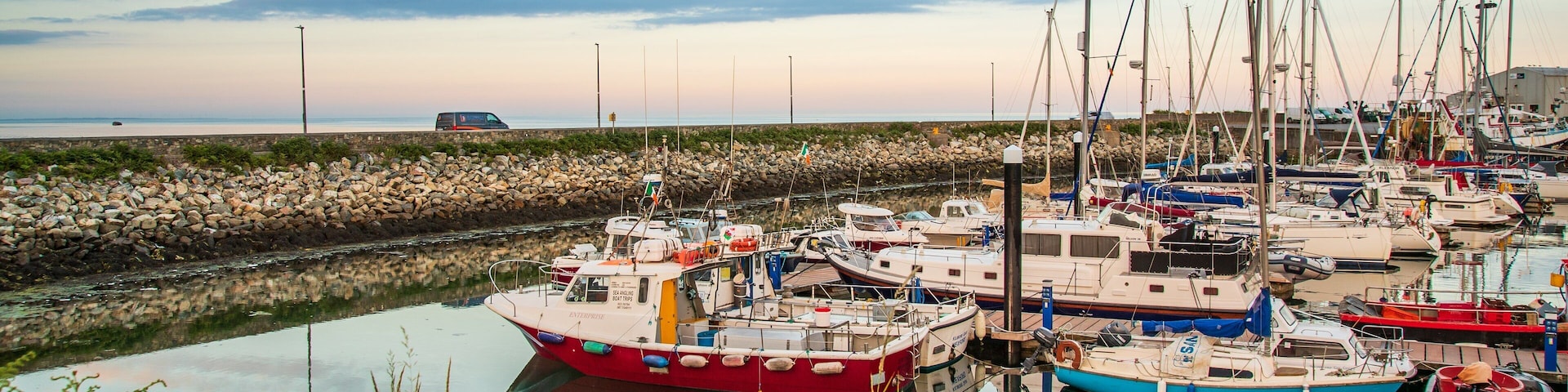 Kilmore showing a bay or harbor and a sunset