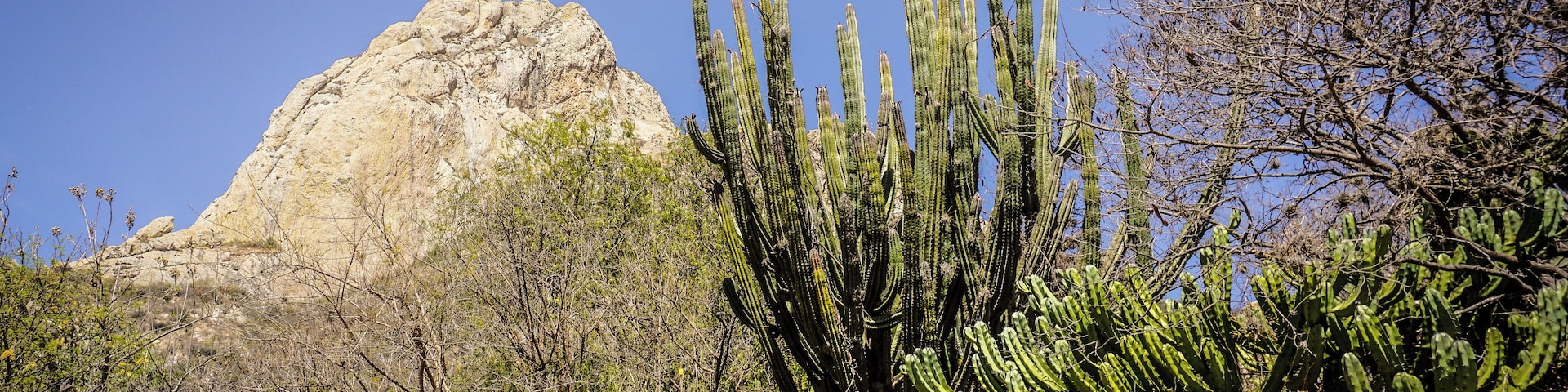 Peña de Bernal, in central Mexico, is the third largest monolith of the World. It is possible to climb it and the town that lays below the boulder is beautiful. This is a 433 meter tall of rough and amazing #Nature