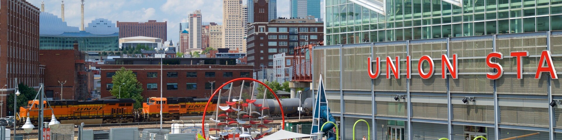 Science City at Union Station which includes signage, landscape views and a city