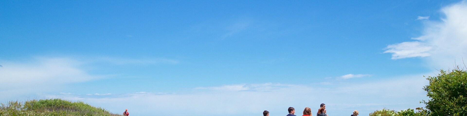 Shadmoor State Park which includes a beach and landscape views as well as a small group of people