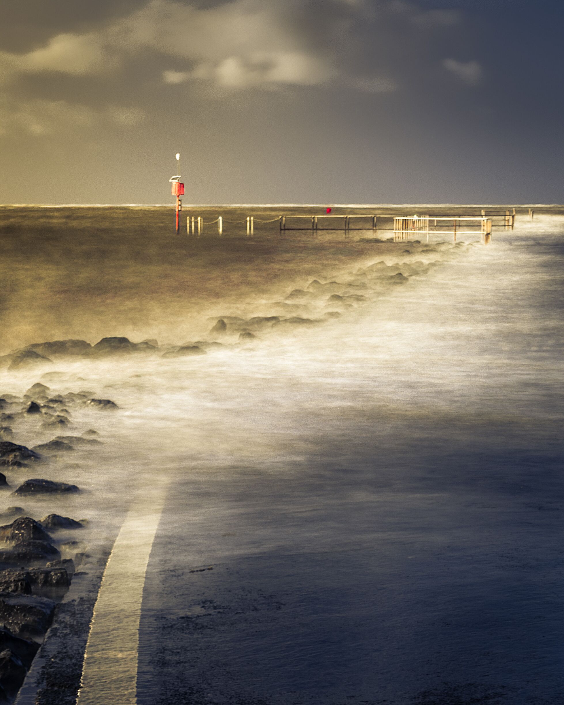 Taken on a very windy day on a fairly high tide. Must be mad. 