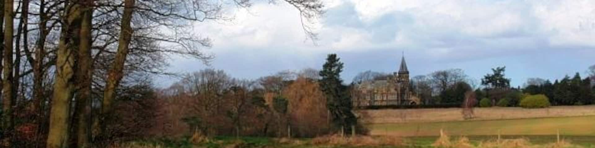 Grey Towers from Starvation Clump Located in the adjacent square (NZ5313) Grey Towers was built in the 1860s by Middlesbrough ironmaster William Randolph Innis Hopkins who was later made bankrupt as a result of the Tay Bridge disaster in 1879 (his firm built the bridge). For twenty years Grey Towers was lived in intermittently until it brought by Sir Arthur Dorman who lived in it for more than thirty years until his death in 1931. Grey Towers once more became vacant until used as the Poole Sanatorium (for Tuberculosis). Eventually the hospital was closed and by the 1990's it was virtually derelict. Now it has been restored and divided into executive flats and apartments.