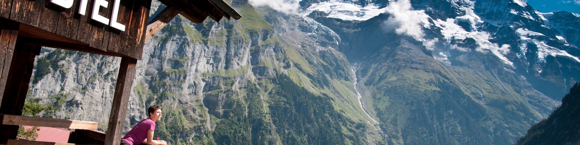 Bernese Alps featuring mountains as well as an individual femail