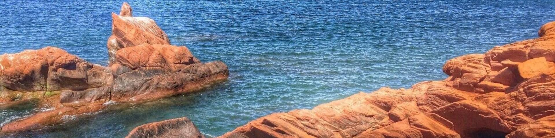 A short hike from the beach, La Bluff offers spectacular views of the red cliffs - which are famous on Îles de la Madeleine. A truly magical sight.